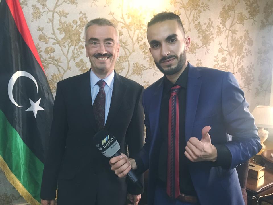 Photographer seized during Tripoli demonstration; Rada accused